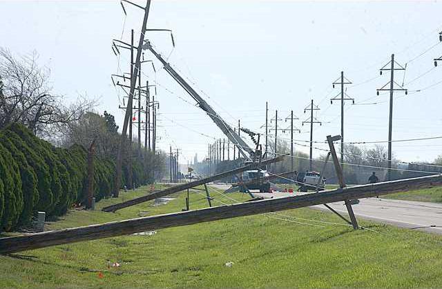 Power lines, homes damaged by storm - Great Bend Tribune