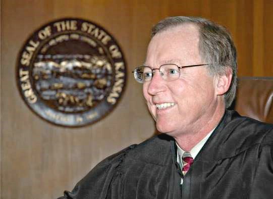 Malone has served five years as Senior Judge on the Kansas Supreme ...