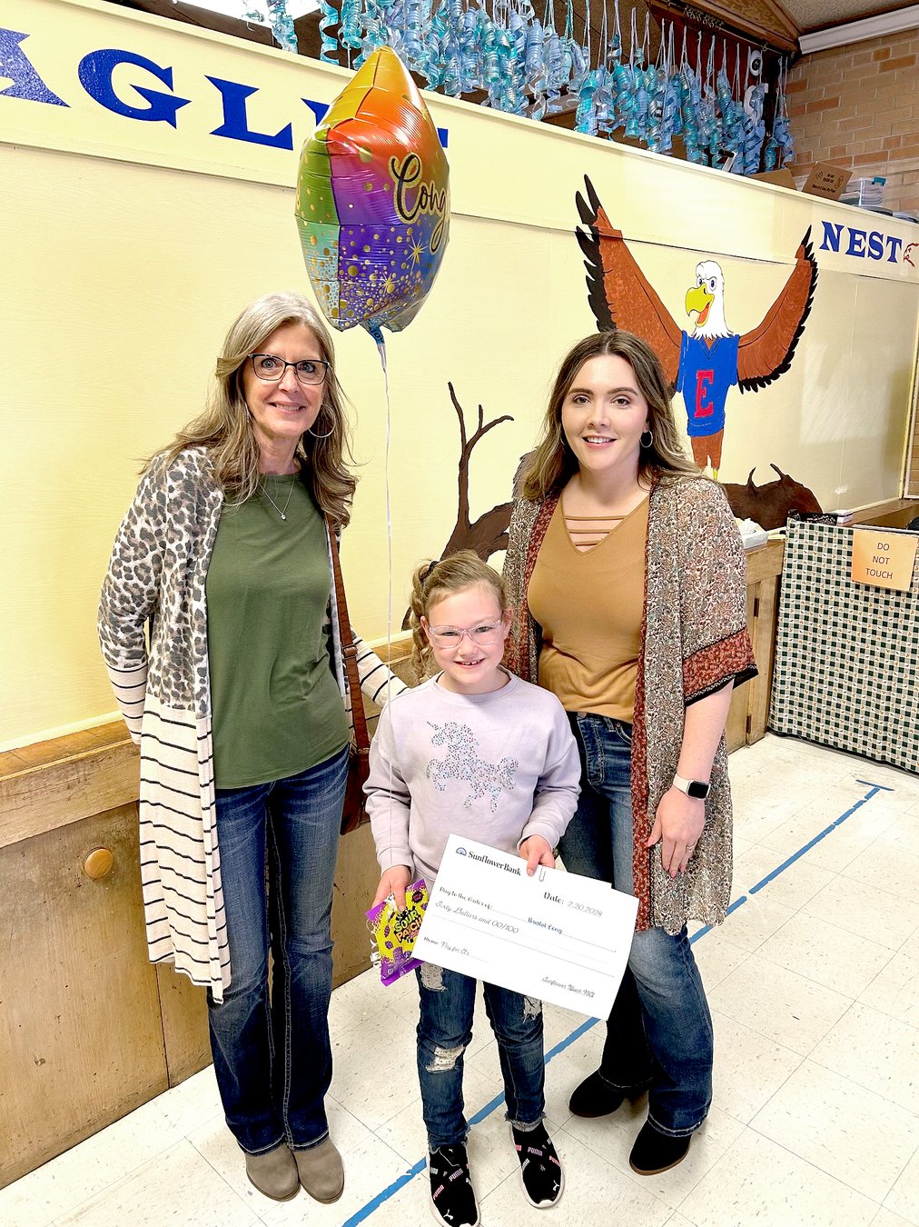 Sunflower Bank delivers checks for A’s - Great Bend Tribune